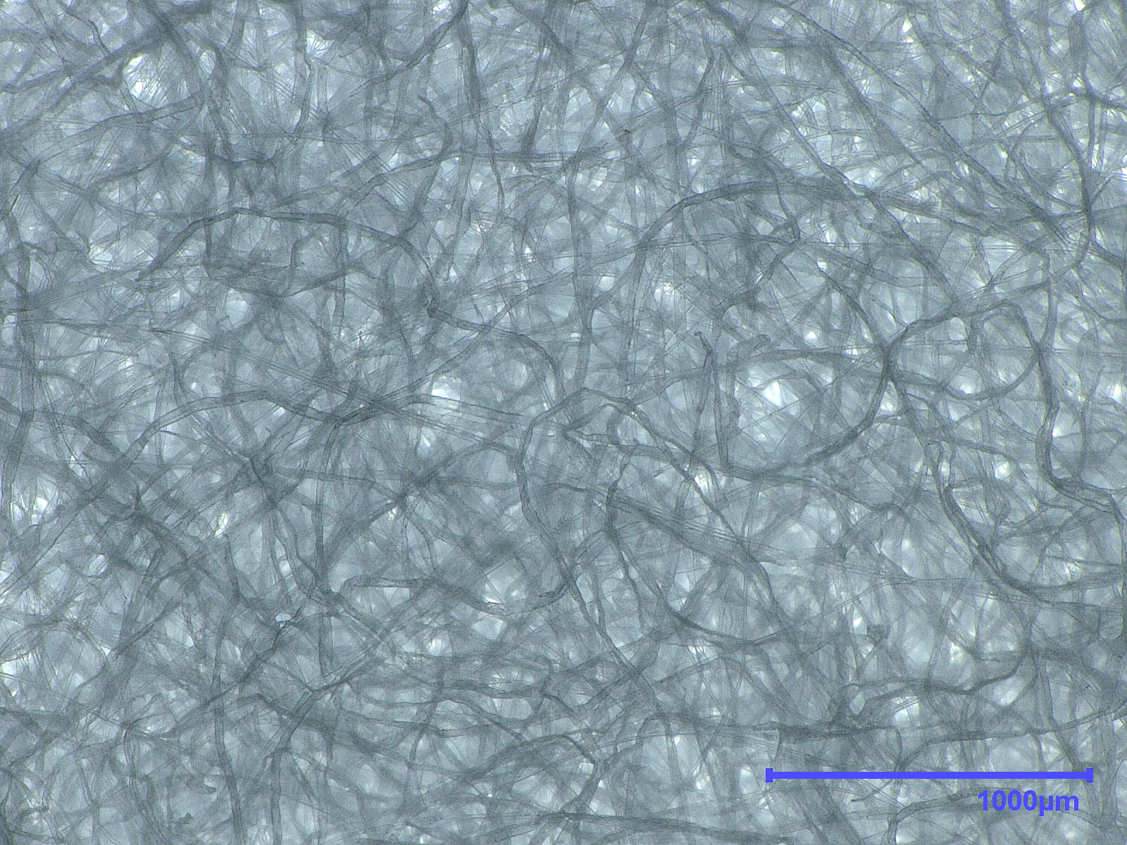 Nonwoven and textile