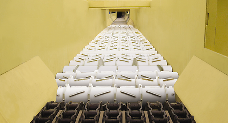 Debarker discharge and chipper infeed systems